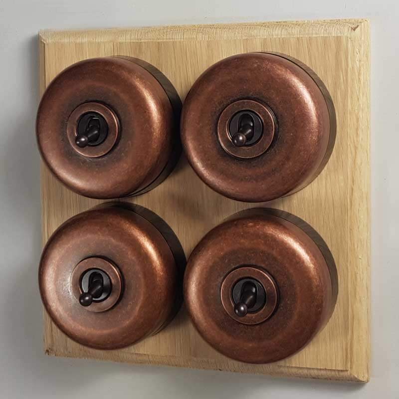 Round Dolly Light Switch 4 Gang on Oak Base Antique Coppered Black ...