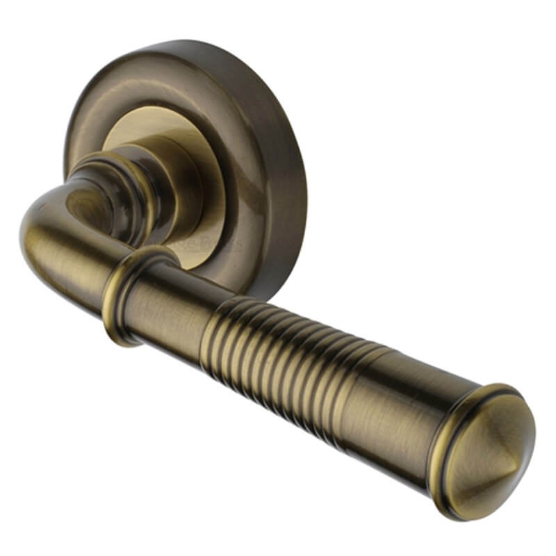 Heritage Colonial Reeded Door Handle V1936 Antique Brass - Broughtons ...