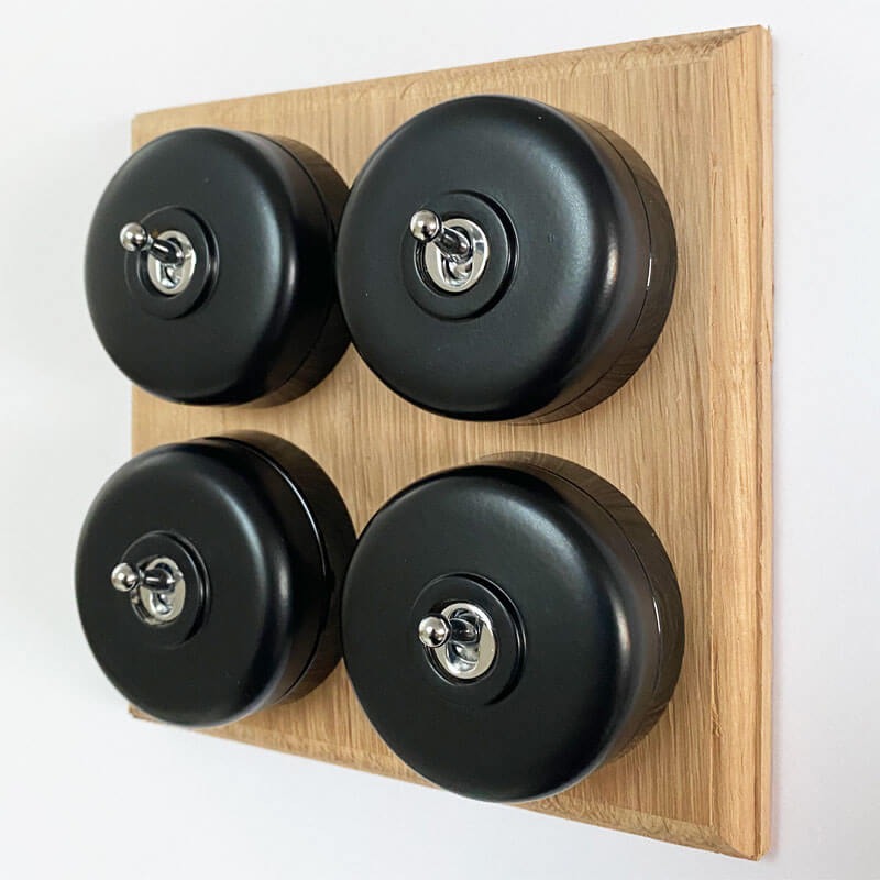 Round Dolly Light Switch 4 Gang Black on Oak Pattress with Black Mounts ...