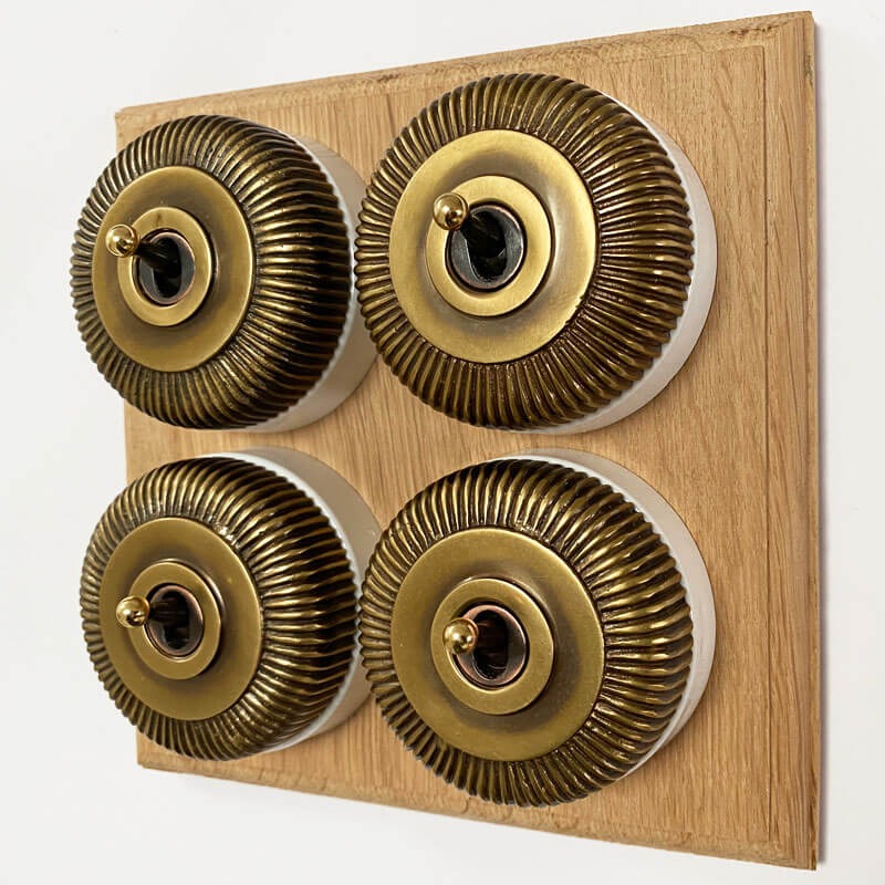 Reeded Round Dolly Light Switch 4 Gang on Oak Base Antique Satin Brass ... Reeded Round Dolly Light Switch 4 Gang on Oak Base Antique Satin Brass ...