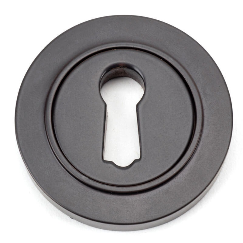 From The Anvil Round Escutcheon Plain Aged Bronze - Broughtons Lighting ...