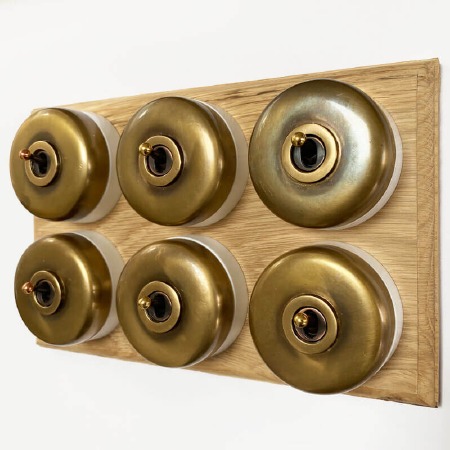Round Dolly Light Switch on Oak Base Antique Satin Brass 6 Gang ...