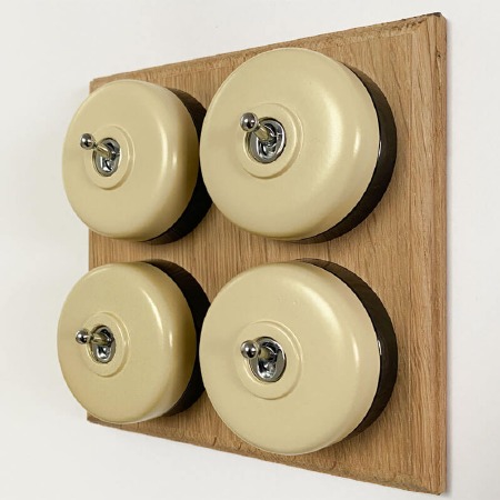 Round Dolly Light Switch 4 Gang Stone on Oak Pattress with Black Mounts ...