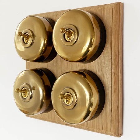 Round Dolly Light Switch 4 Gang on Oak Base Renovated Brass Black ...