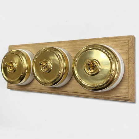 Reed and Ribbon Dome Dolly Light Switch 3 Gang Polished Brass Unlac ...